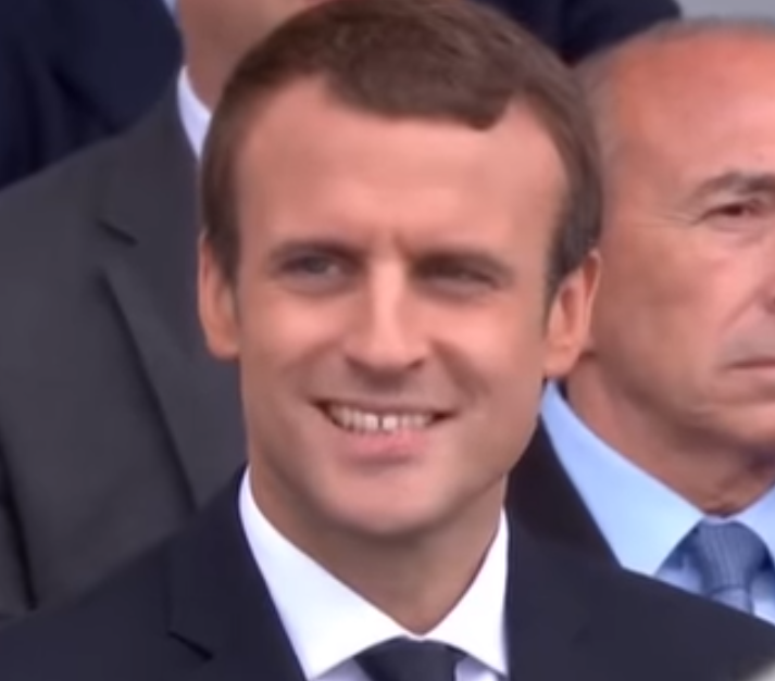 Donald Trump pouts as a French marching band plays Daft Punk - LGBTQ Nation