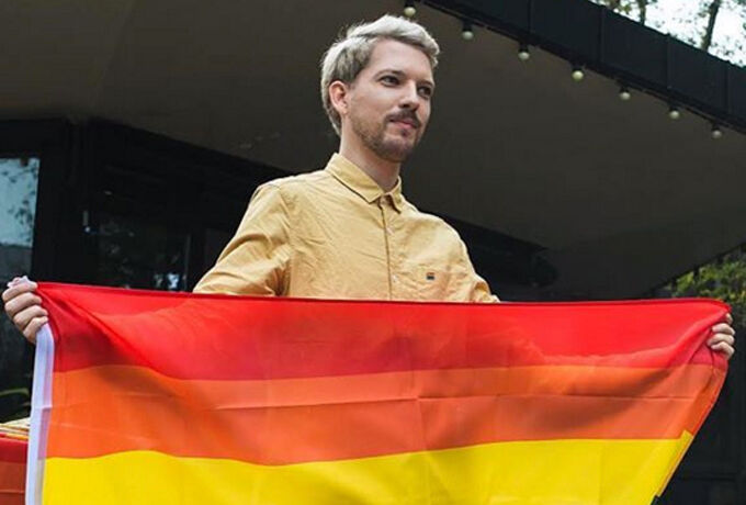 A sea of rainbow flags fly after anti-LGBTQ arson in Lithuania - LGBTQ ...