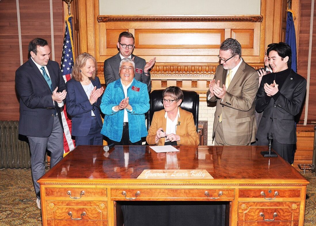 New Kansas governor restores LGBTQ protections as first official act in ...