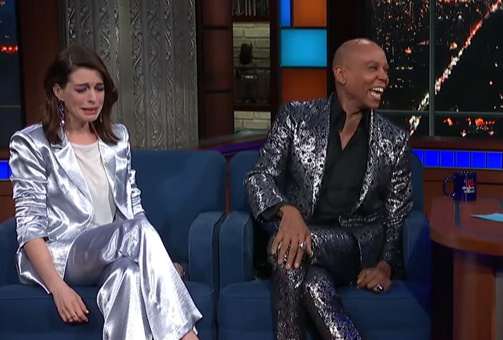Stephen Colbert surprised Anne Hathaway by helping her meet RuPaul. She ...