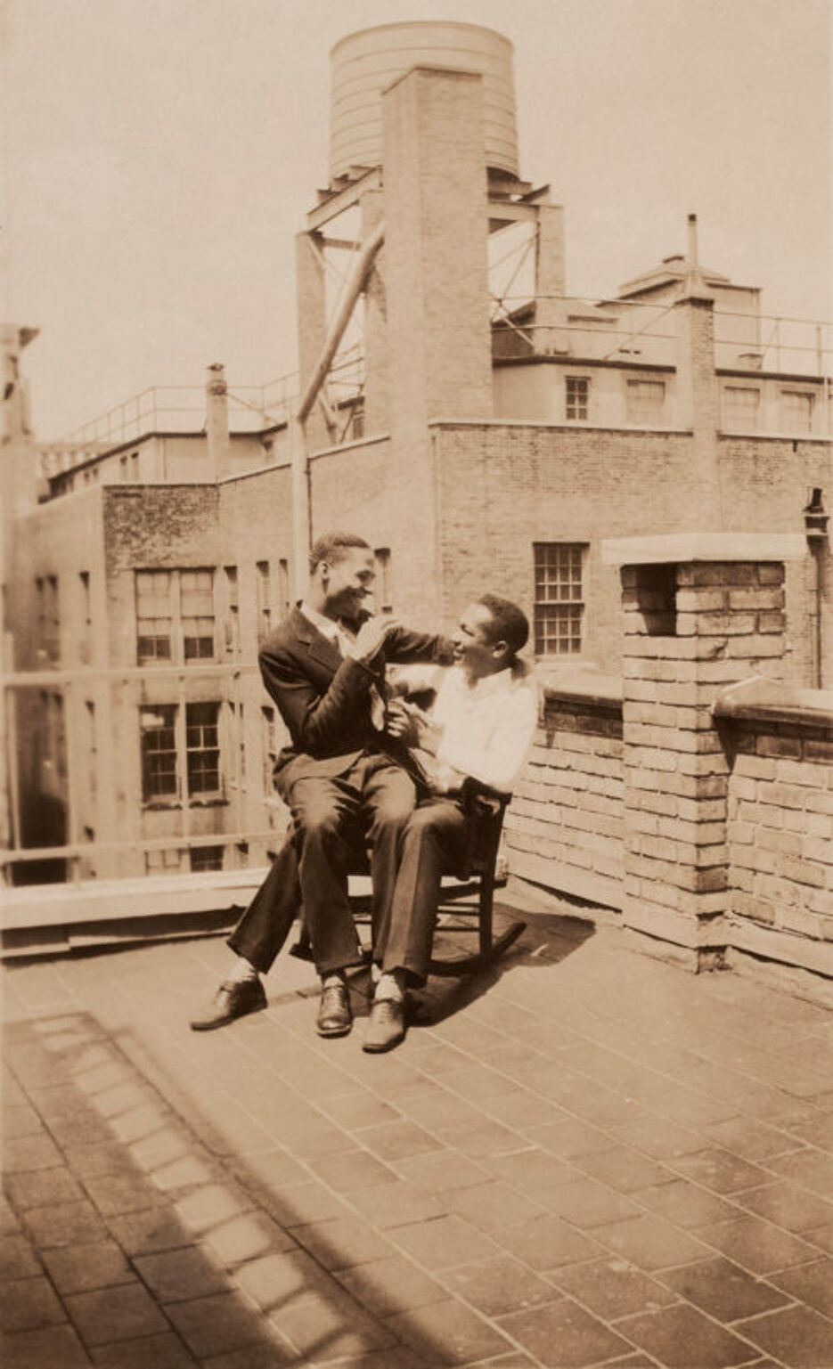Historical photos of men in love: The rocking chair on the rooftop ...