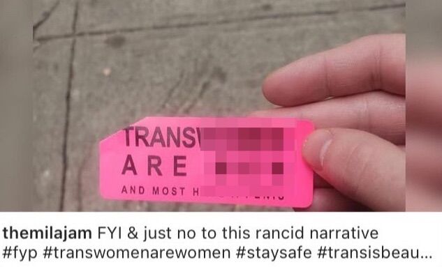 Man on the street confronts women posting vulgar anti-trans stickers ...