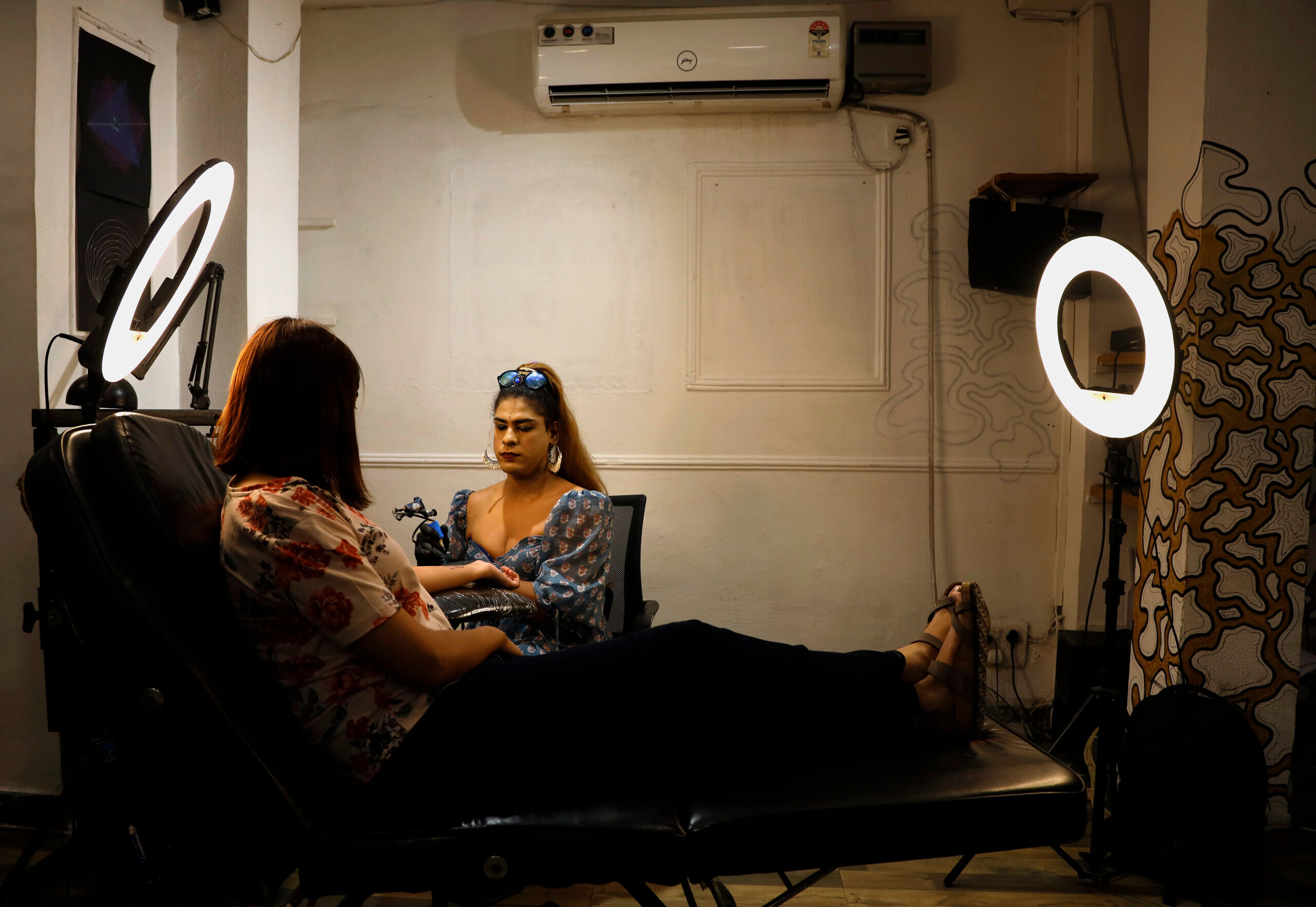 Stuck between two worlds, the tattoo studio is the only place this ...