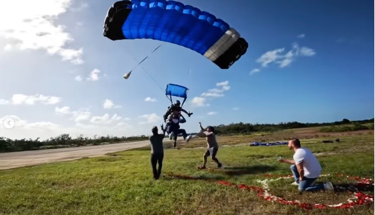 This couple's epic skydiving engagement story takes queer love to new ...